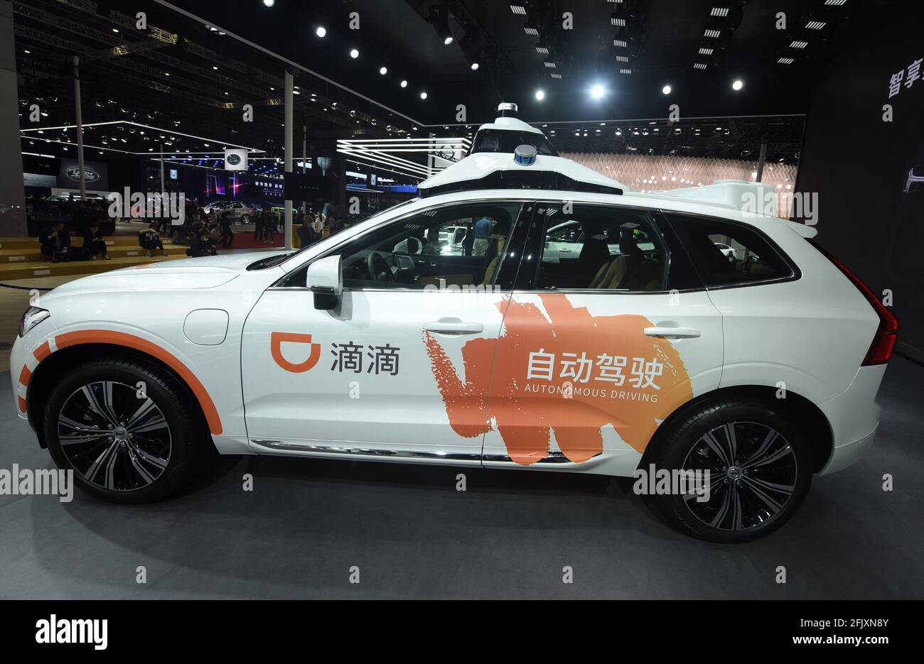 SHANGHAI, CHINA - APRIL 19, 2021 - Visitors look at a driverless car ...