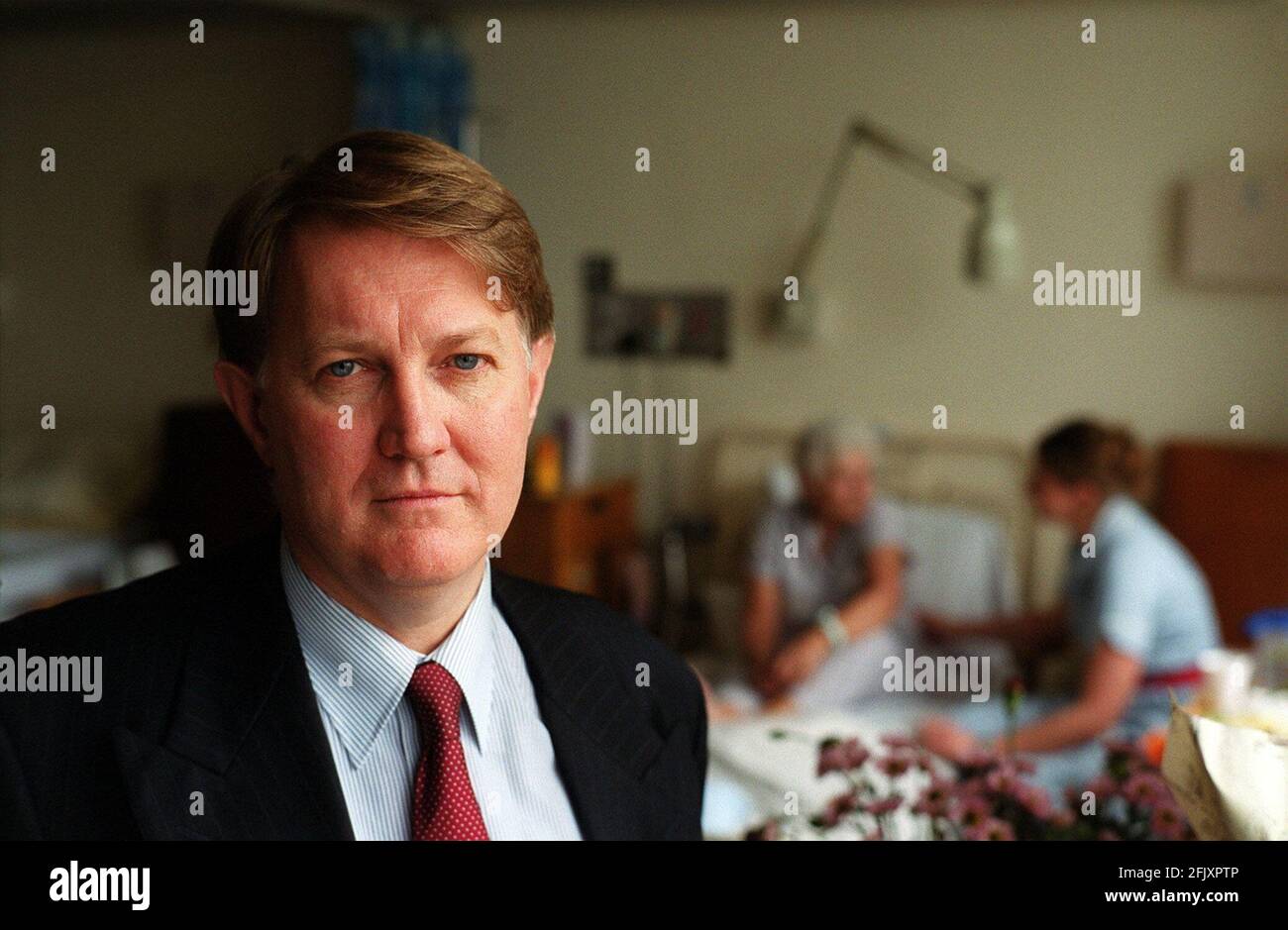 Professor Mike Richards standing in hospital ward Stock Photo - Alamy