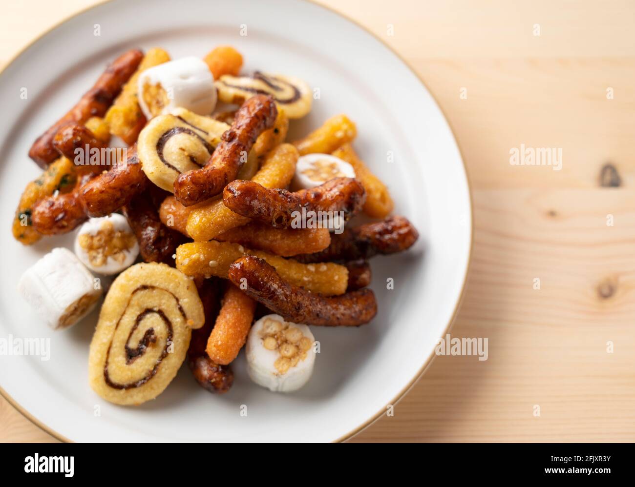 Various types of karinto placed on a wooden background, viewed from ...