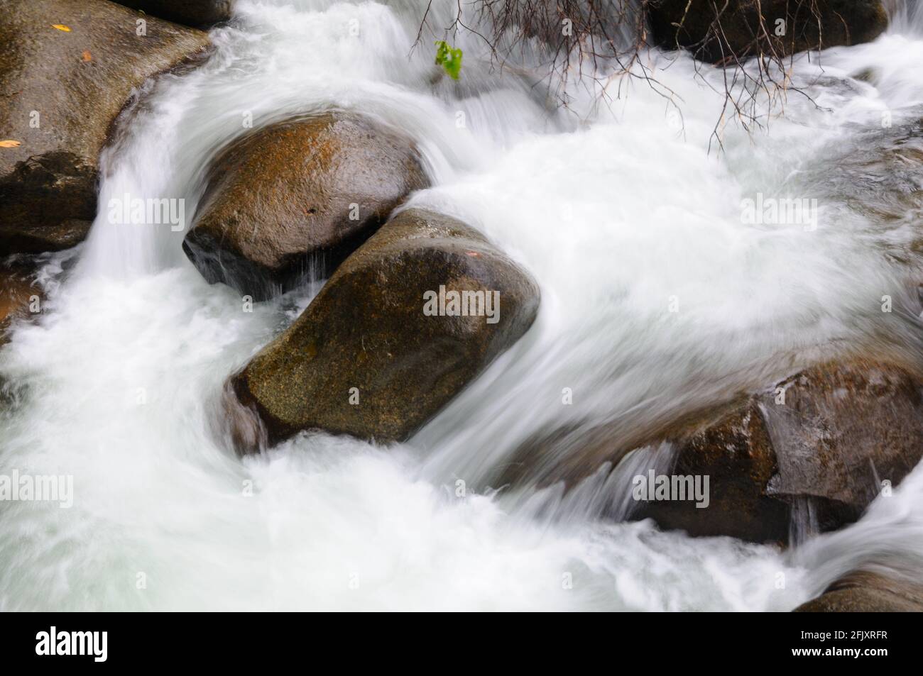 Mountain Water Cascading Over Rocks Stock Photo - Alamy