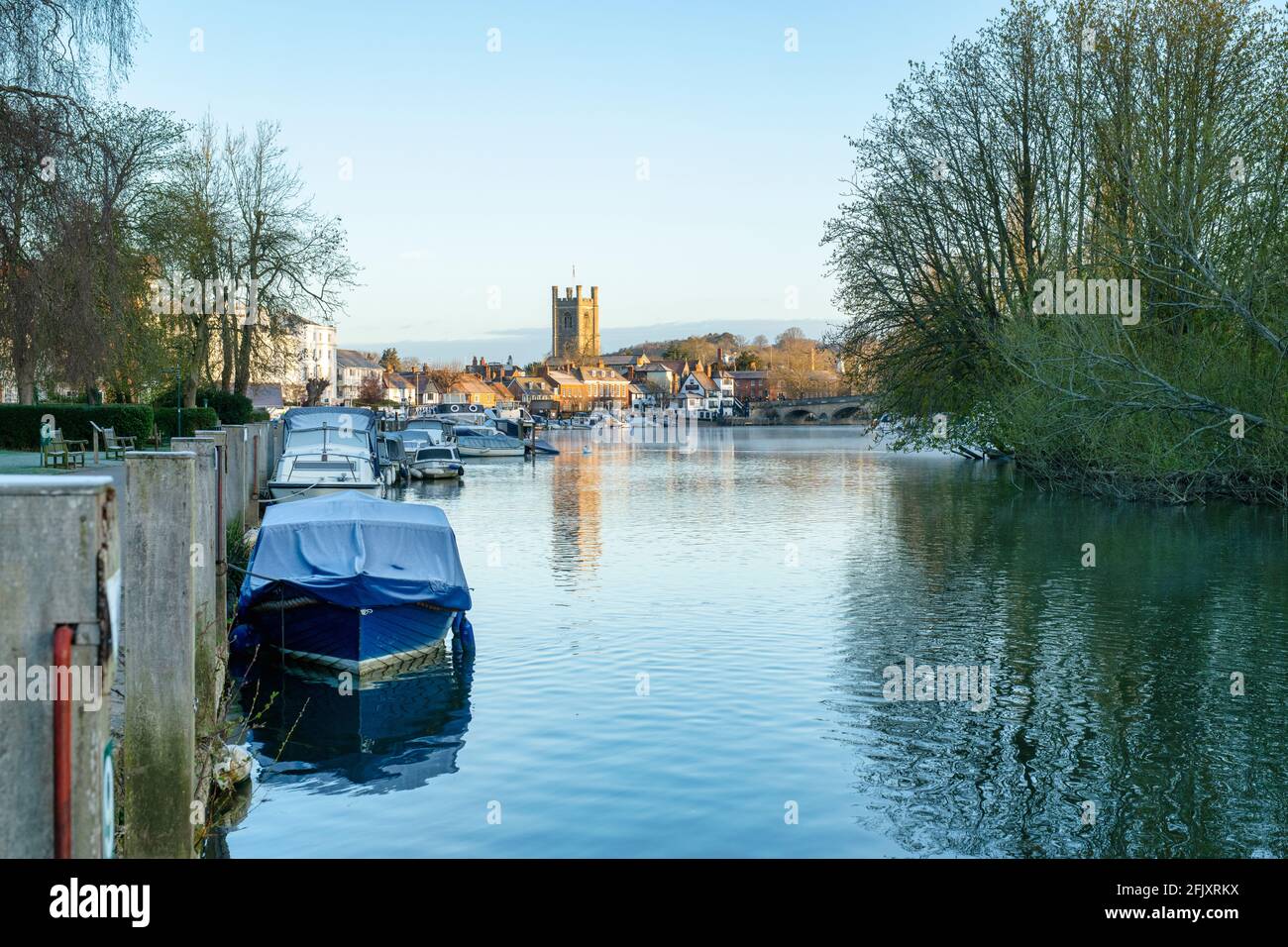 River boats on the river thames at mill meadows on a frosty spring ...