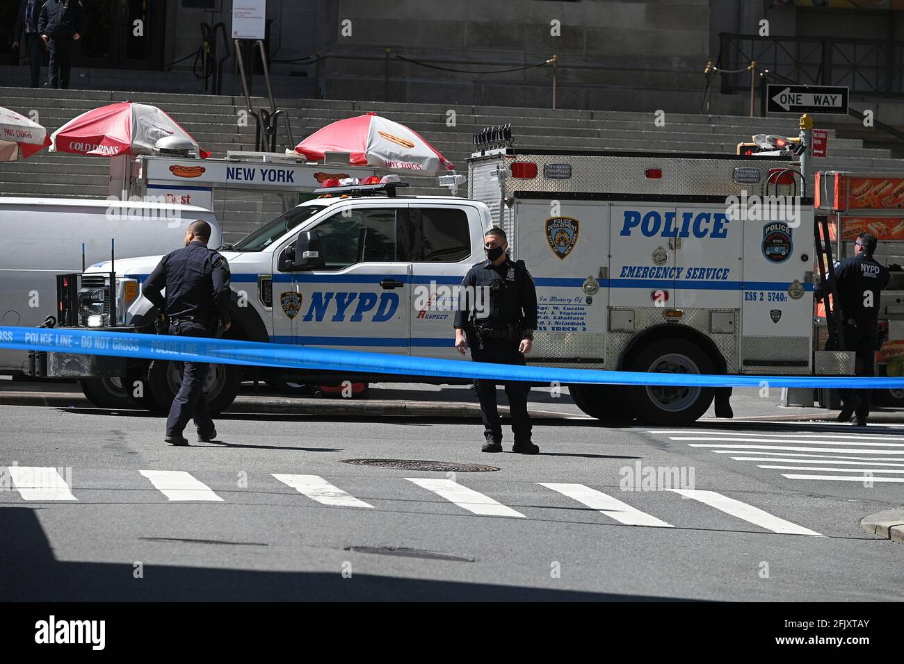 New York, USA. 26th Apr, 2021. NYPD officers stand behind blue police ...