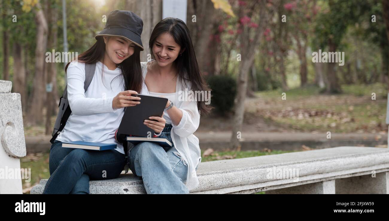 Teenage students using digital tablet hi-res stock photography and ...