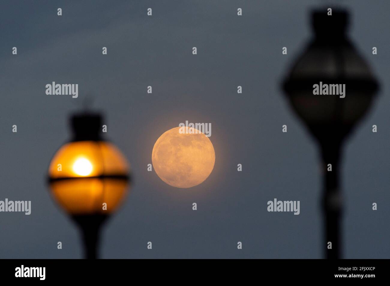 London, Britain. 26th Apr, 2021. The full moon, also known as the ...
