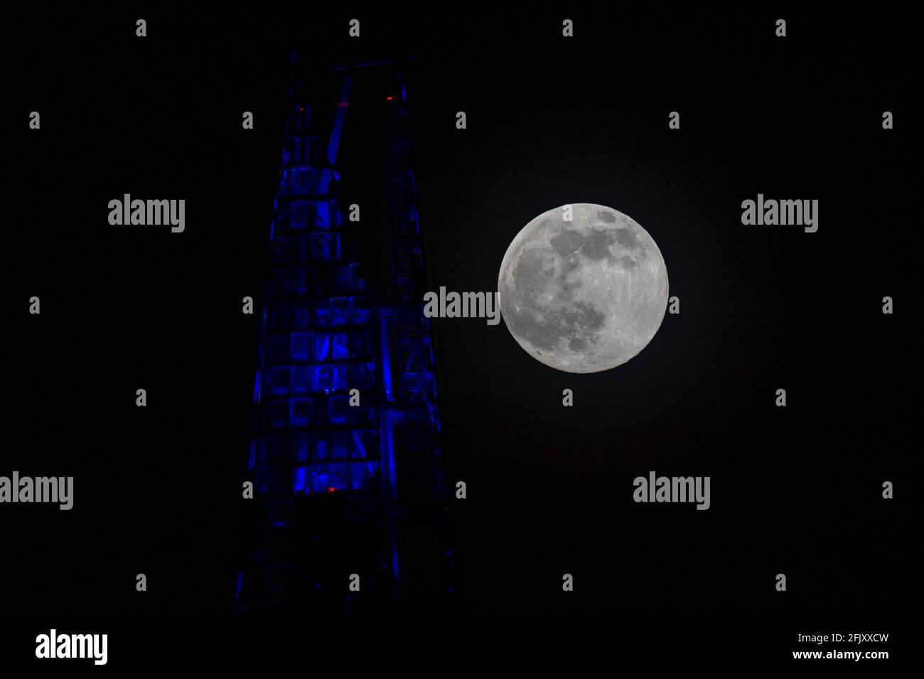 London, Britain. 26th Apr, 2021. The full moon, also known as the ...