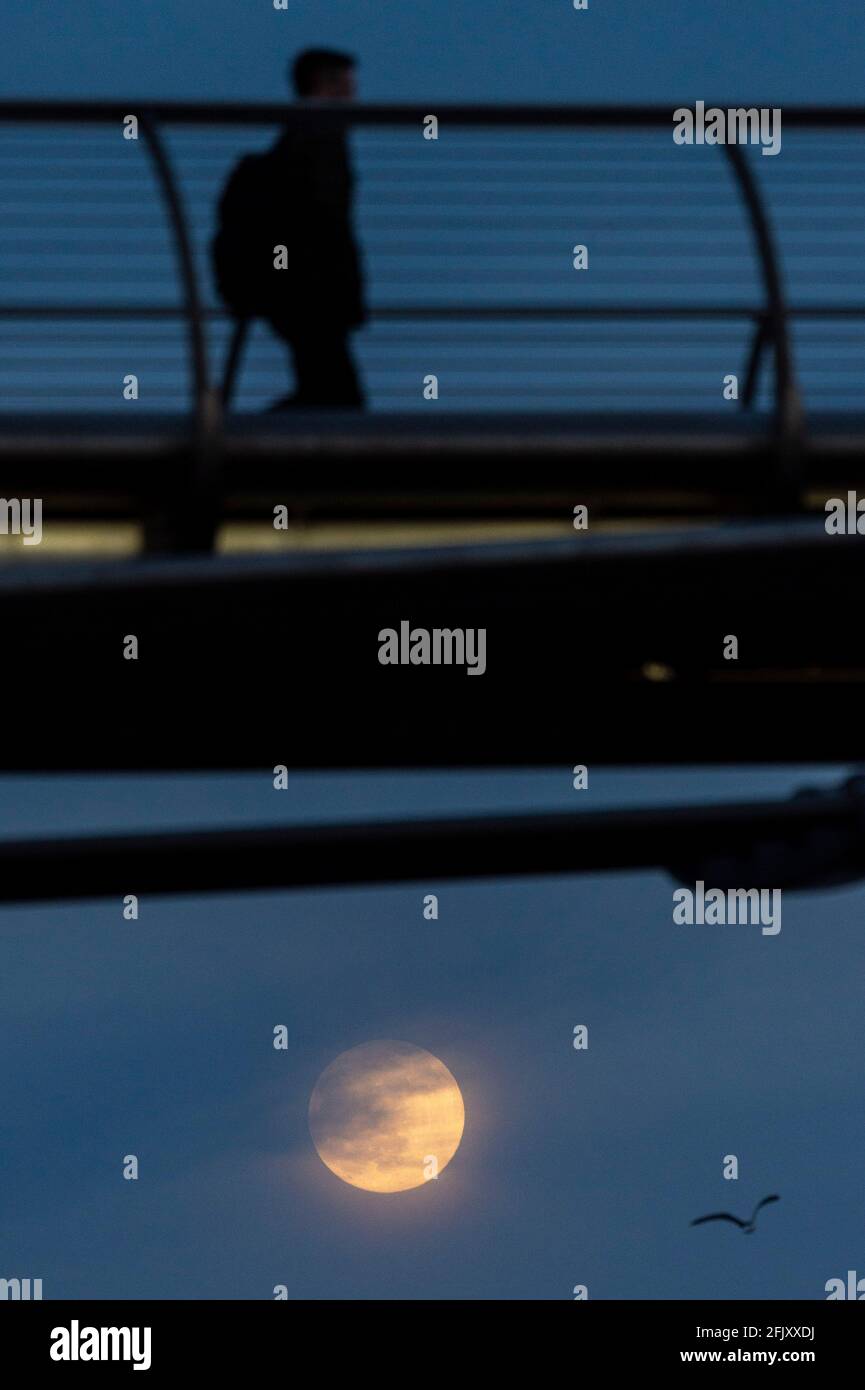 London, Britain. 26th Apr, 2021. The full moon, also known as the ...