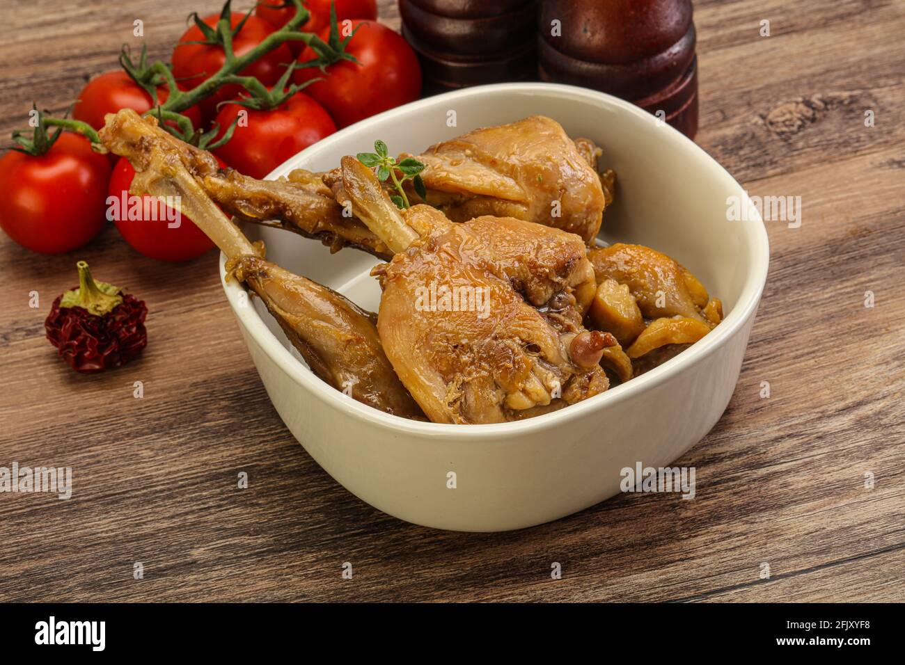 Rabbit stew in sweet and spicy sauce Stock Photo - Alamy