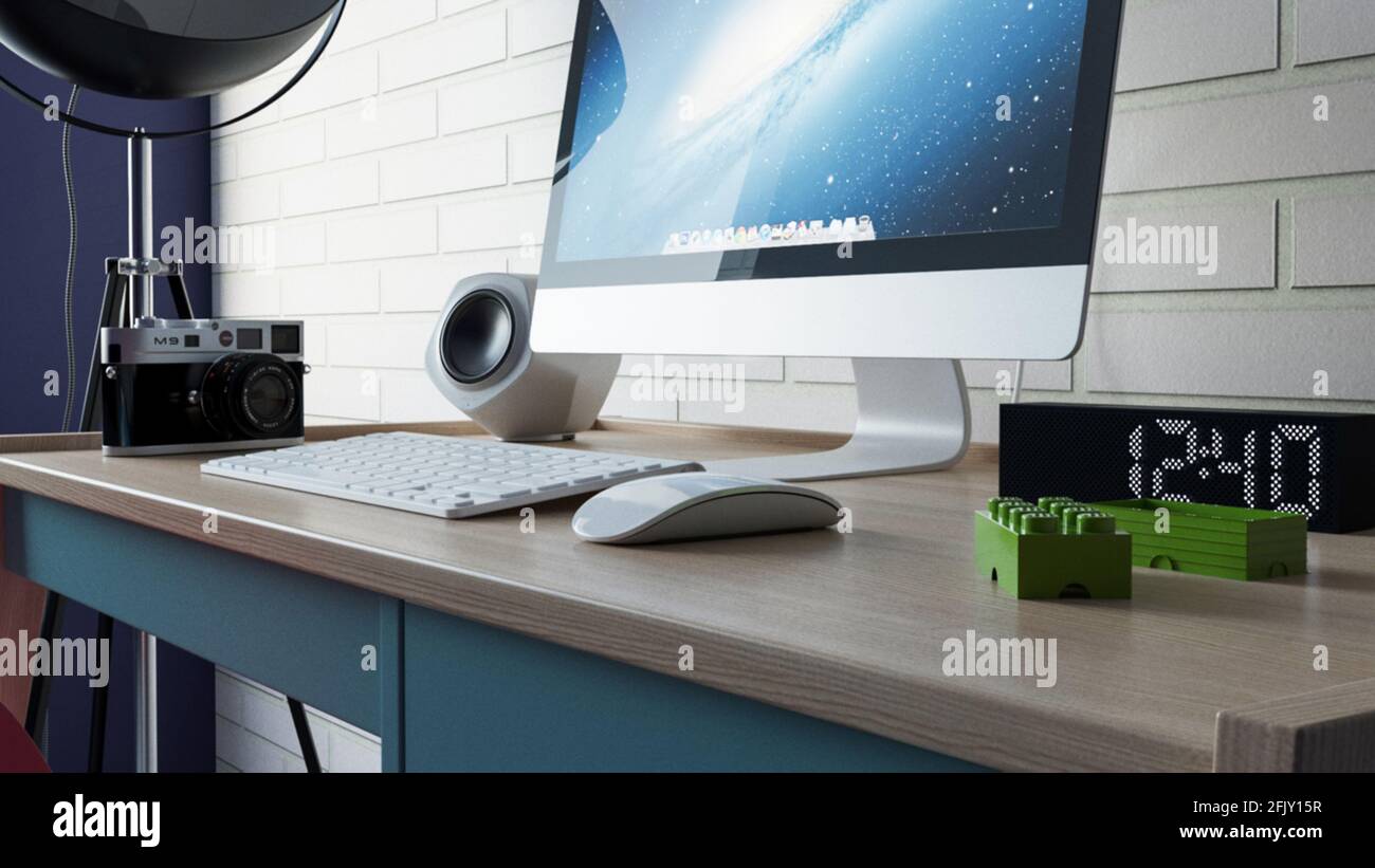 Close-up of tidy workspace with notebooks, floral poster, computer ...