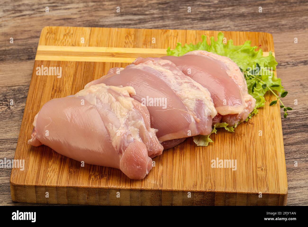 Raw chicken boneless and skinless leg for cooking Stock Photo - Alamy