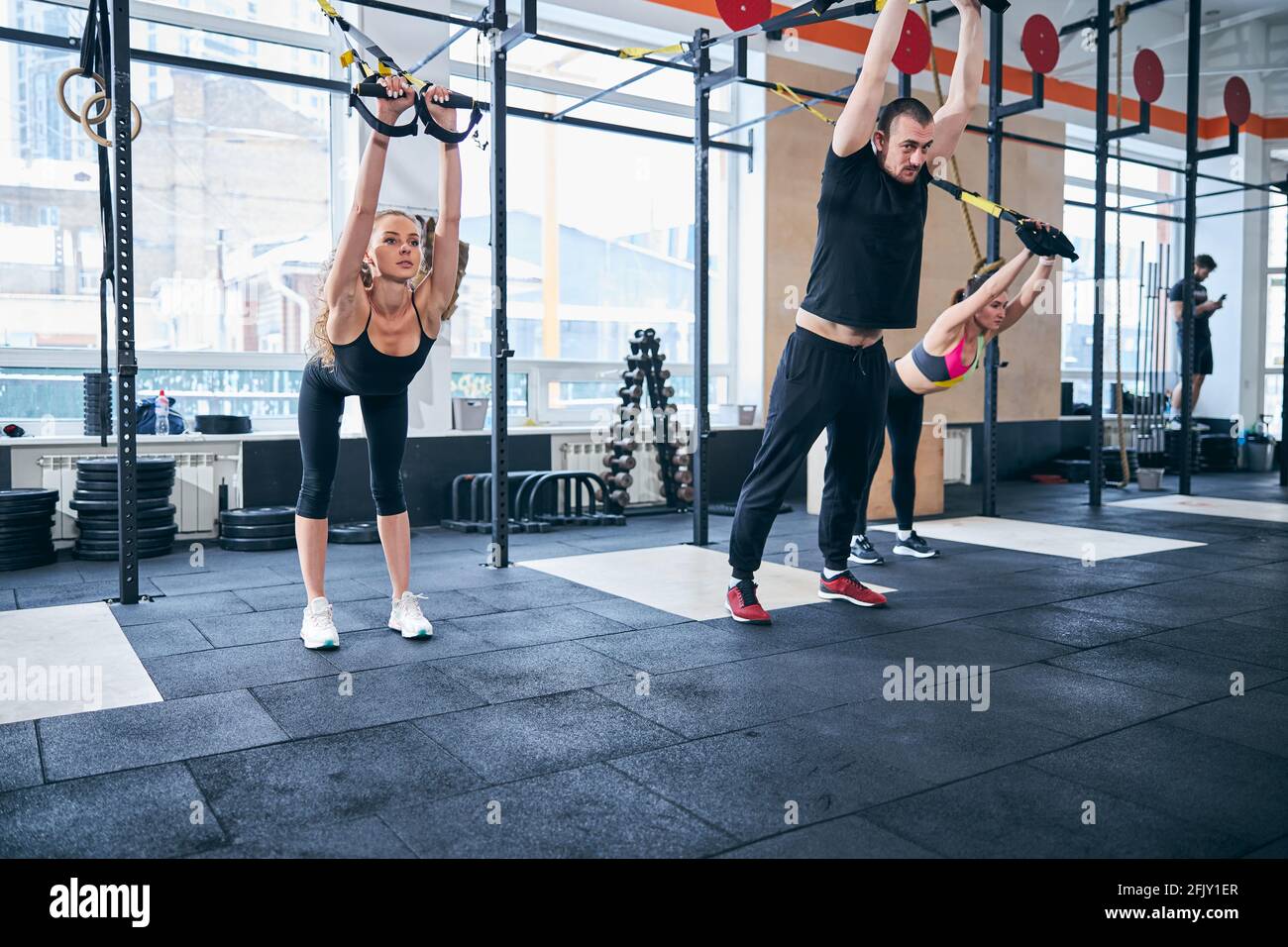 Three sportspeople hi-res stock photography and images - Alamy