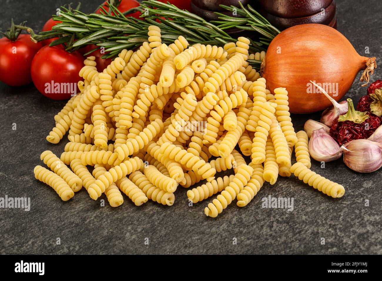 Raw Italian wheat pasta - Fusilli for cooking Stock Photo - Alamy