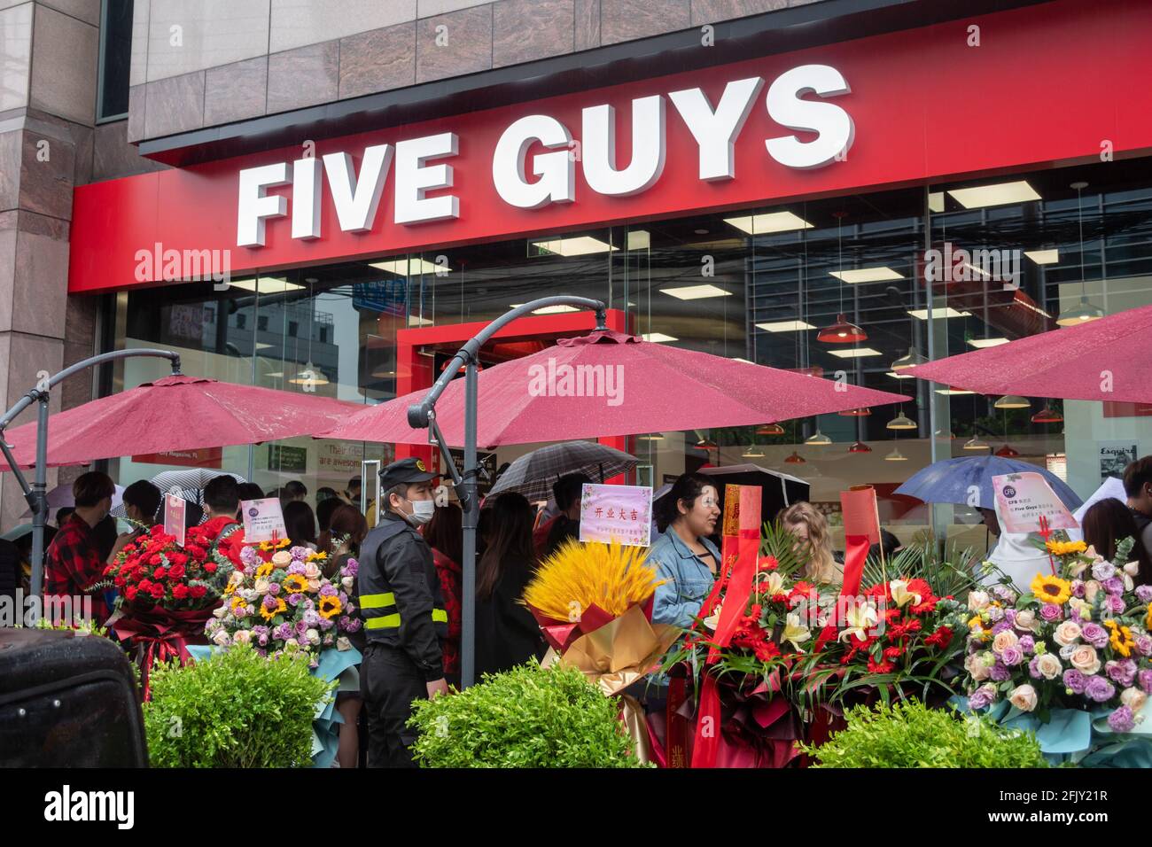 SHANGHAI, CHINA - APRIL 27, 2021 - Diners line up in front of the US ...