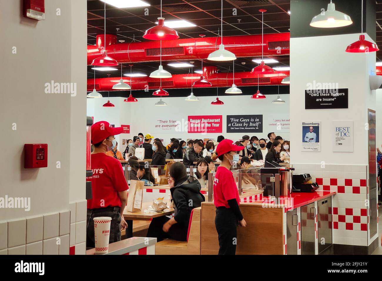 SHANGHAI, CHINA - APRIL 27, 2021 - Diners line up in front of the US ...