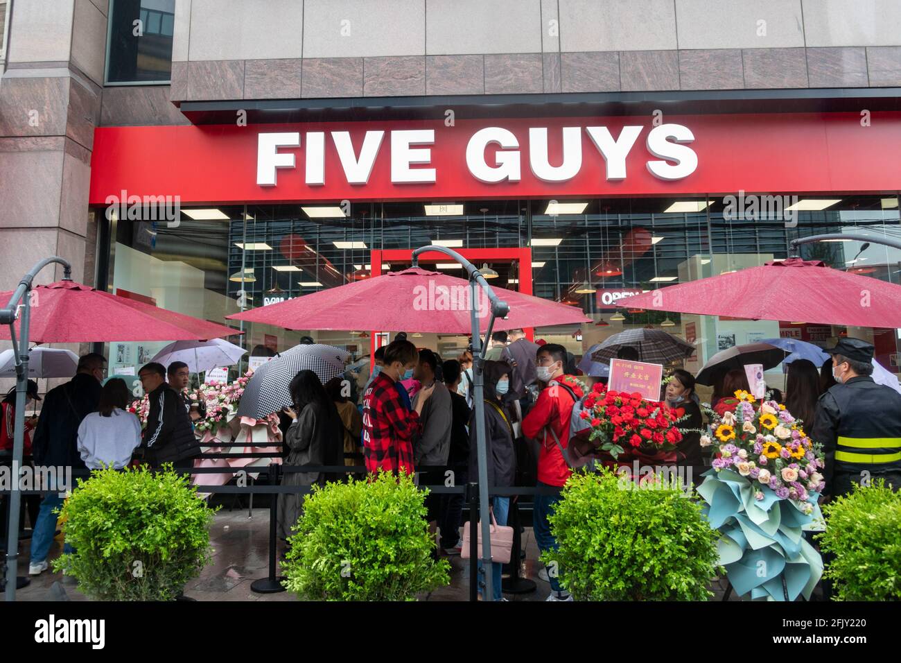 SHANGHAI, CHINA - APRIL 27, 2021 - Diners line up in front of the US ...