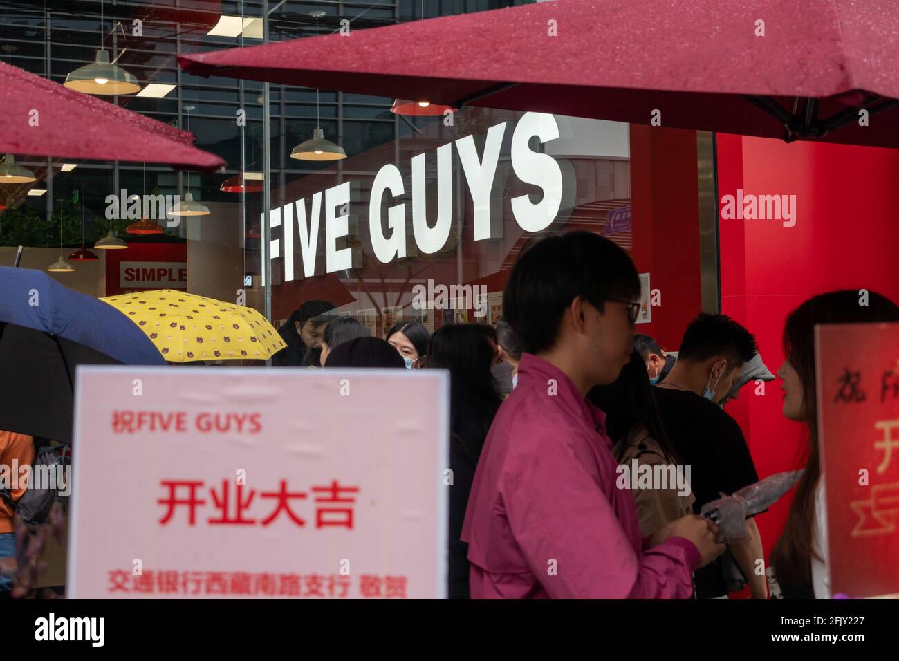 SHANGHAI, CHINA - APRIL 27, 2021 - Diners line up in front of the US ...