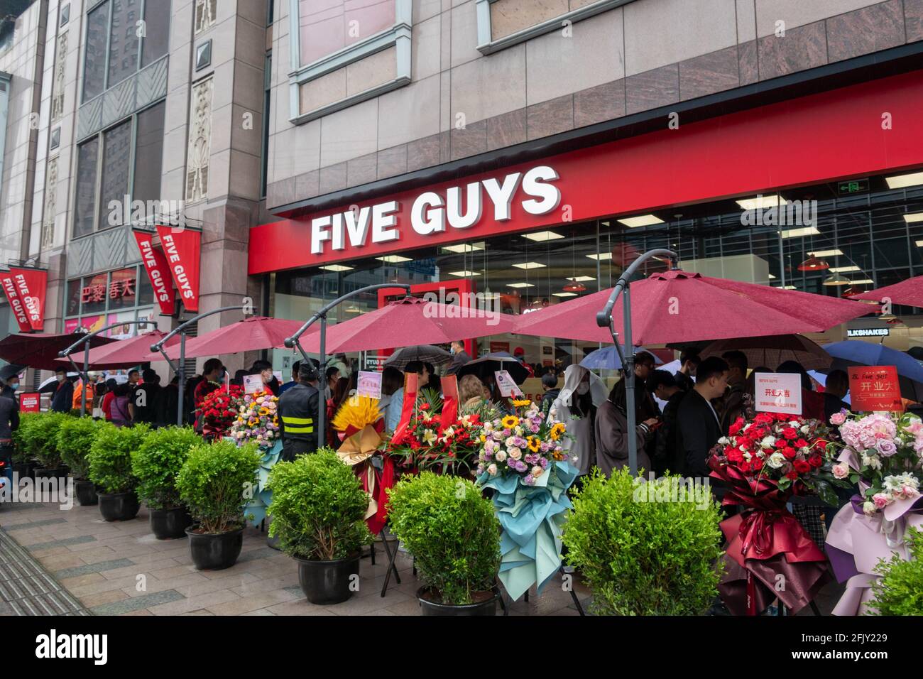 SHANGHAI, CHINA - APRIL 27, 2021 - Diners line up in front of the US ...