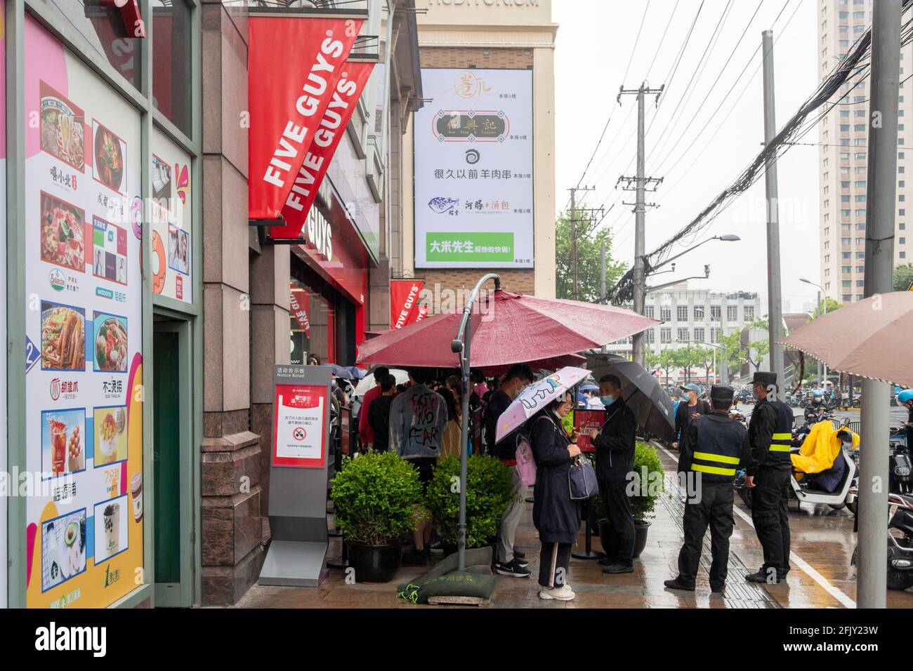 SHANGHAI, CHINA - APRIL 27, 2021 - Diners line up in front of the US ...
