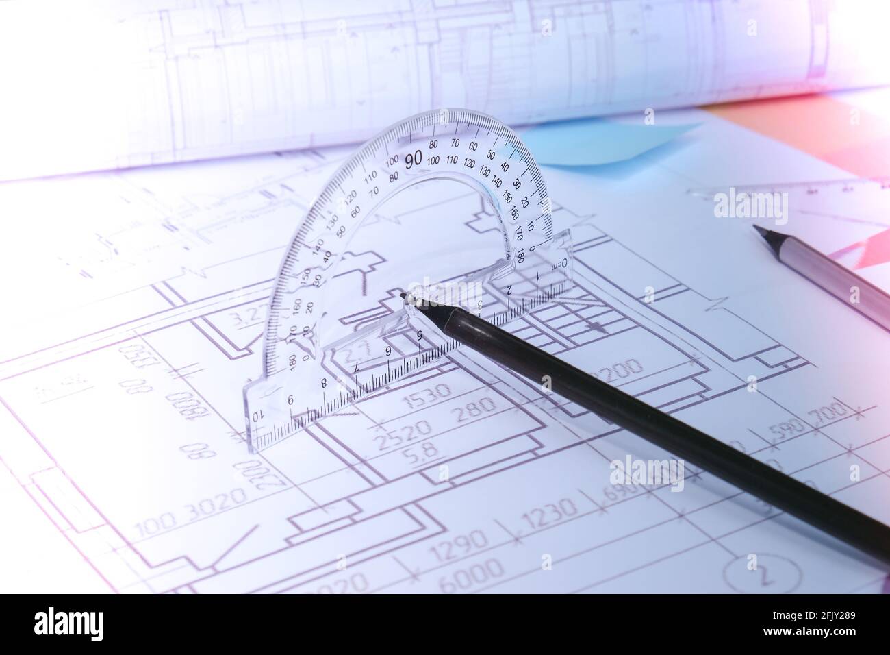 A pencil with a protractor. Architectural Project drawings with tools ...
