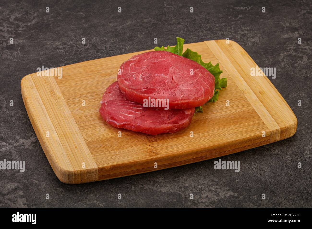 Raw tuna fish steak for grill Stock Photo - Alamy