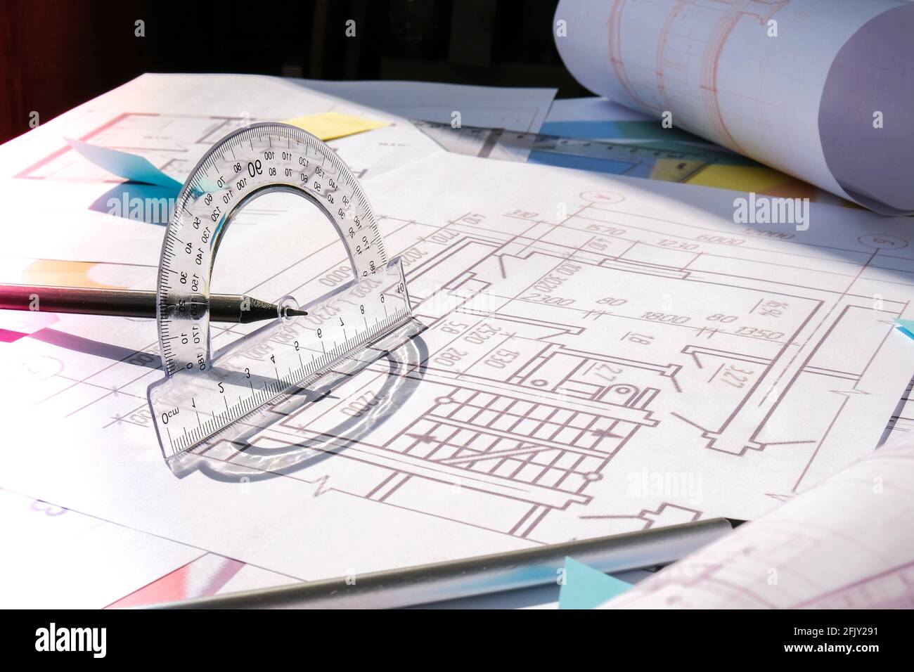 A pencil with a protractor. Architectural Project drawings with tools ...