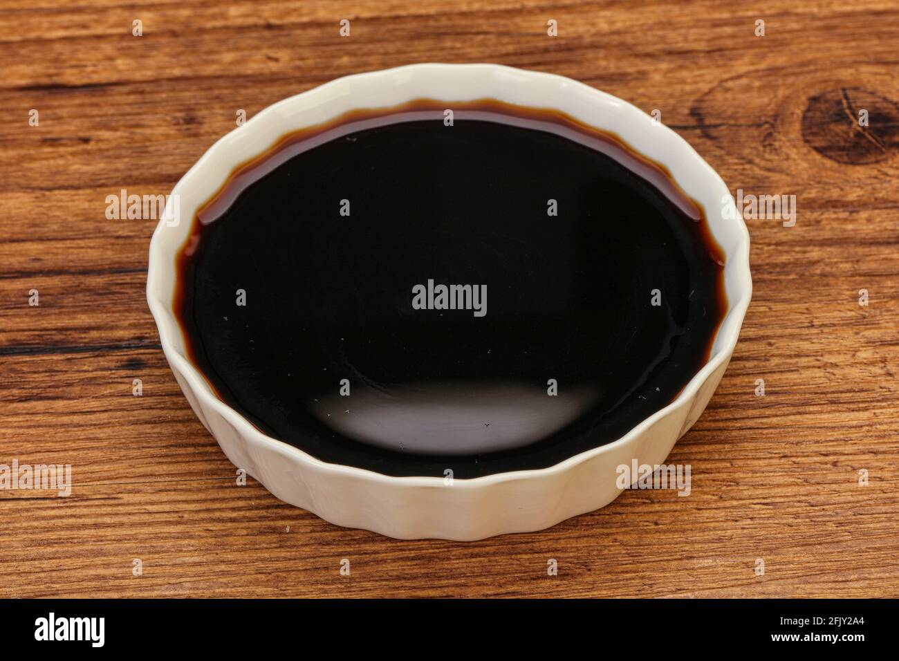 Asian cuisine - soya sauce in the bowl Stock Photo - Alamy