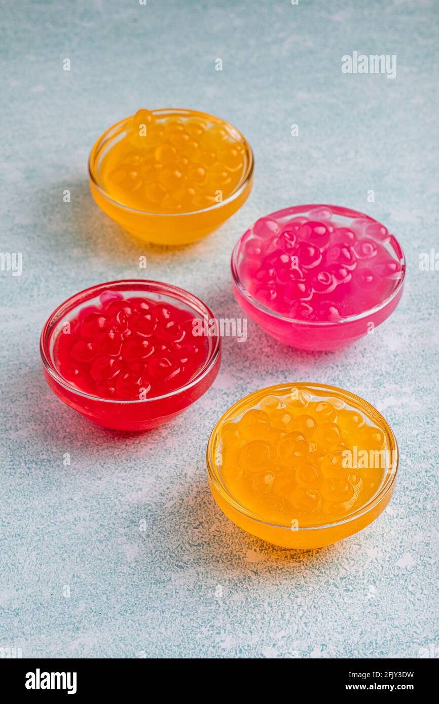 Different bowls of colorful tapioca pearl bubbles Stock Photo - Alamy