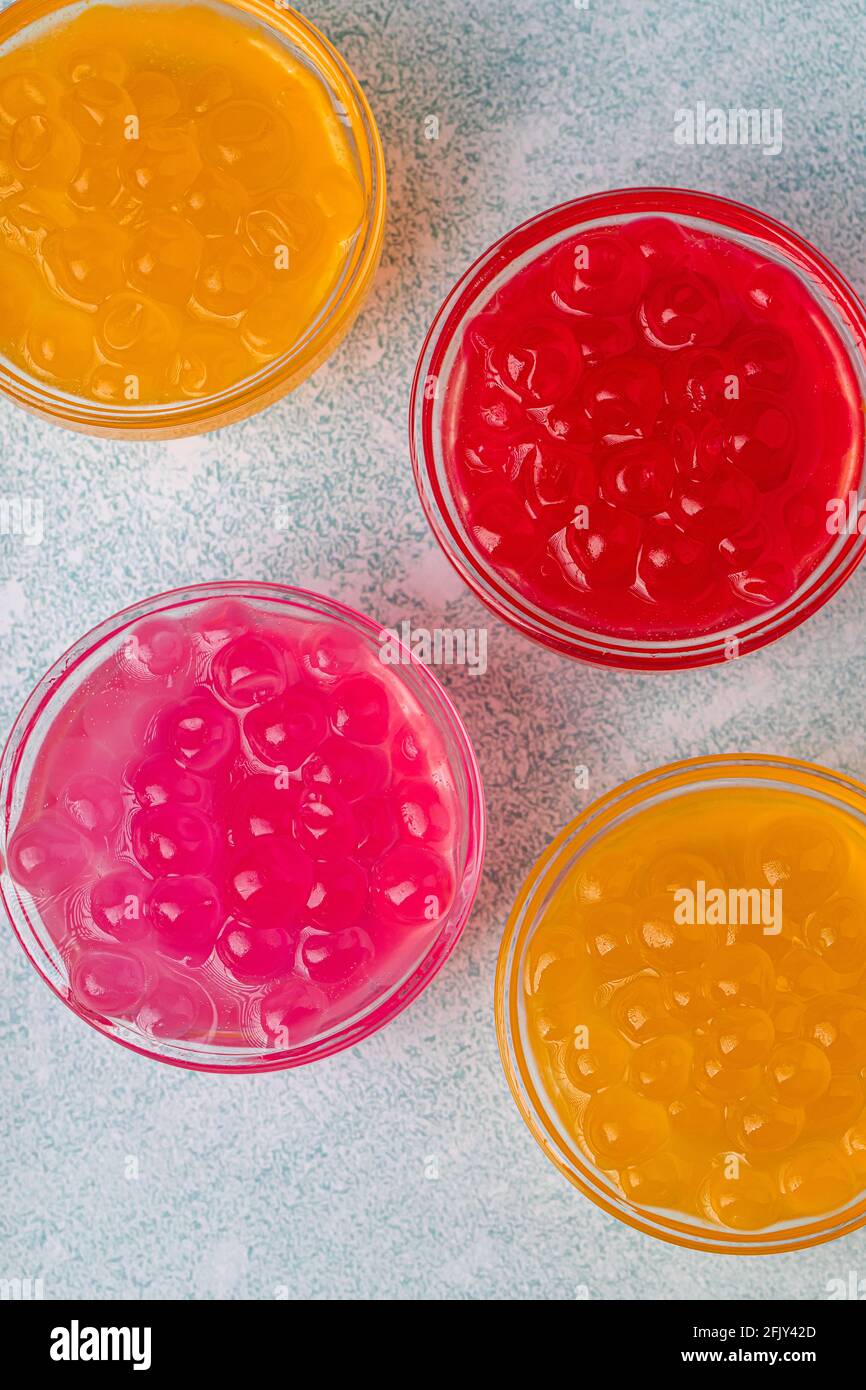 Different bowls of colorful tapioca pearl bubbles Stock Photo - Alamy