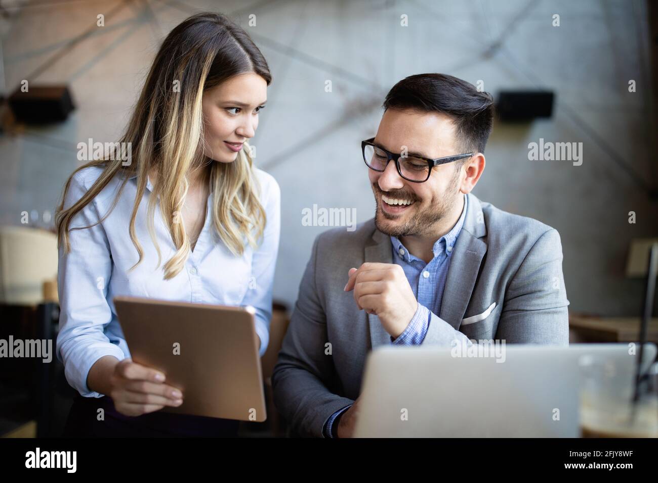 Successful company with happy employees in modern office Stock Photo ...