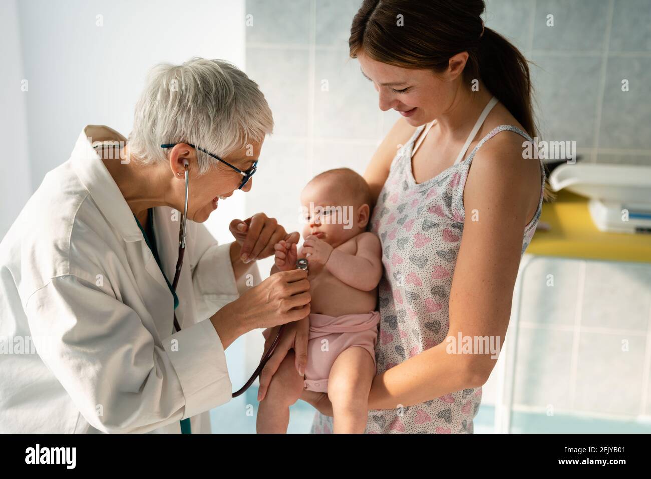 Pediatric doctor exams little baby. Health care, medical examination ...