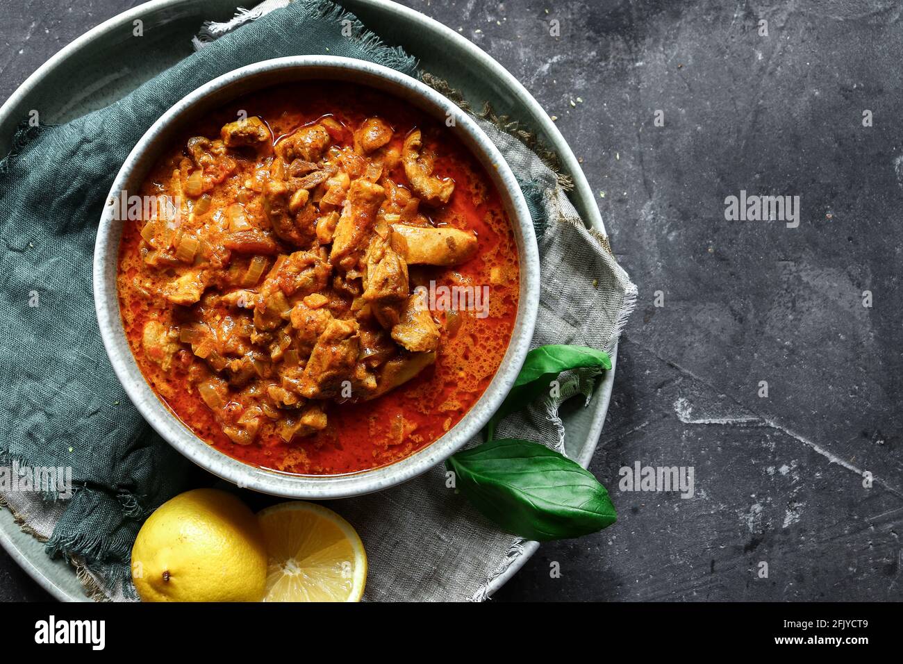 Traditional curry and ingredients. Tikka Masala chicken and rice ...
