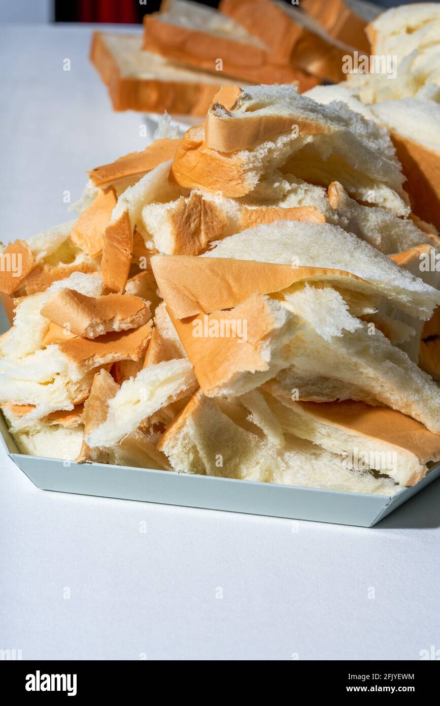A plate of shredded raw toast bread, shredded toast Stock Photo - Alamy