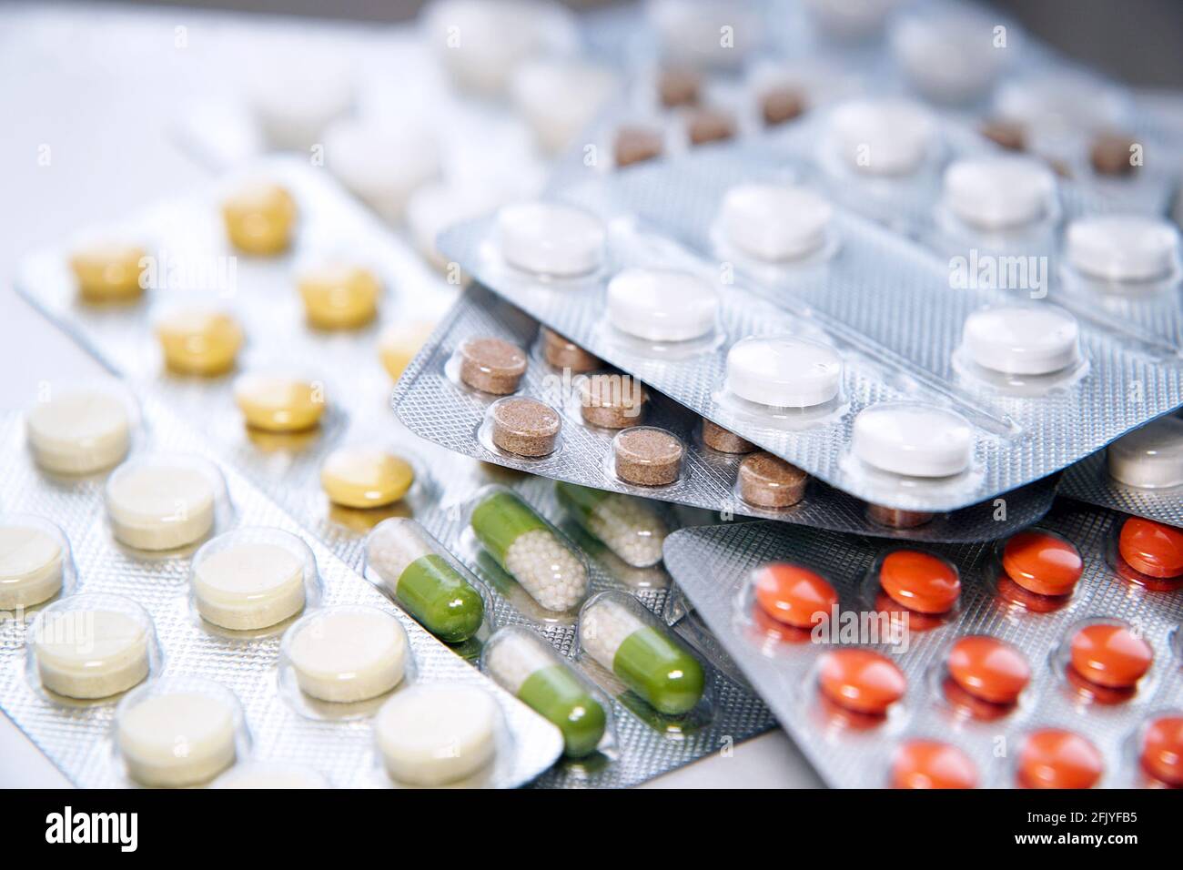 Overall view of pharmaceutical tablets and capsules in packages in ...