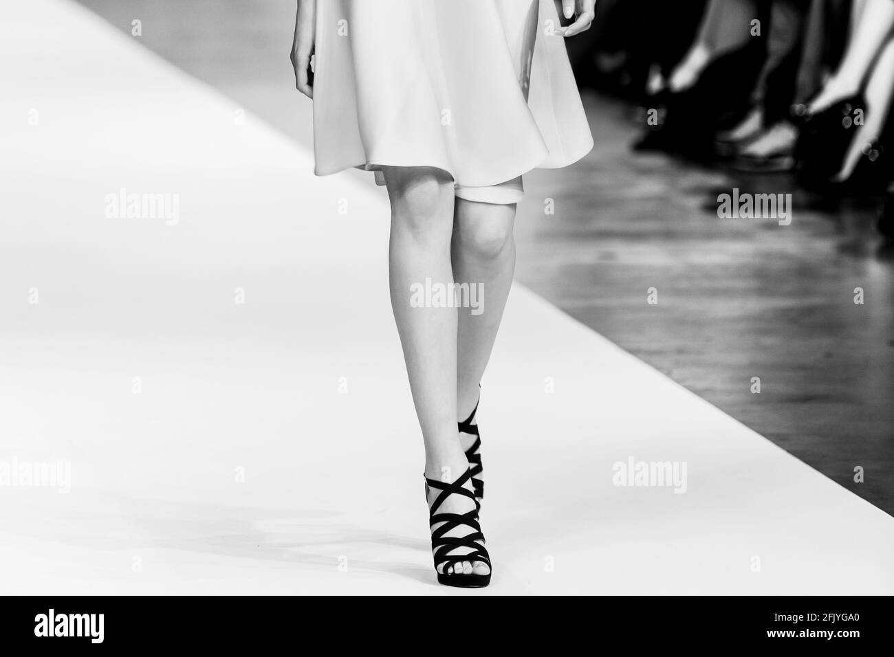 Female walking fashion show Black and White Stock Photos & Images - Alamy