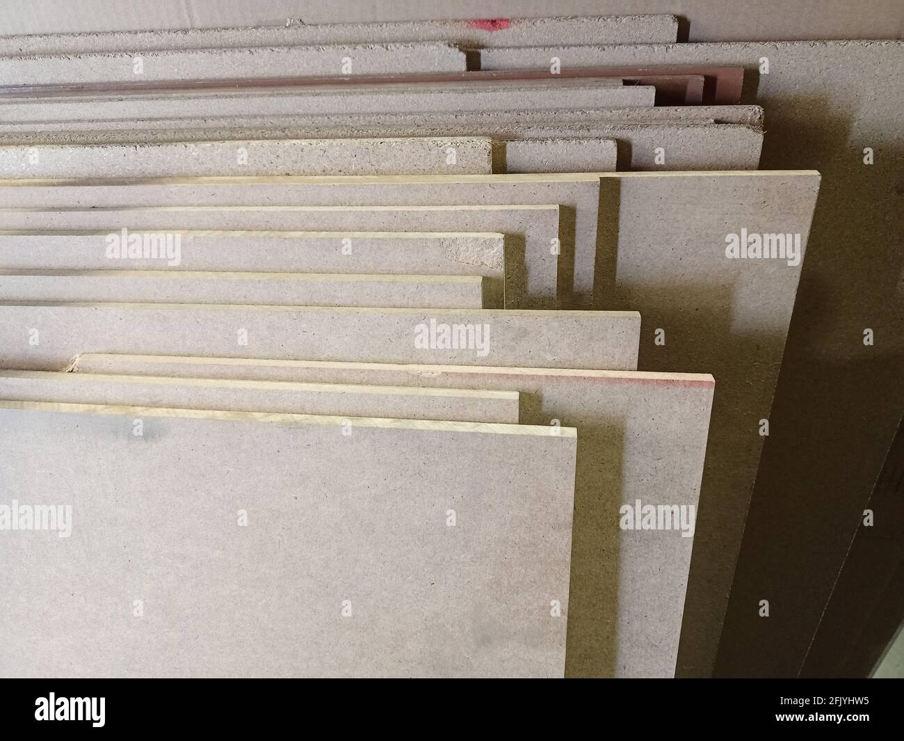 A stack of plywood sheets for construction Stock Photo - Alamy