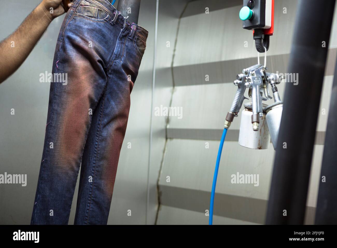 Jeans pants getting spray paints in Eco-Friendly Professional Spray and ...