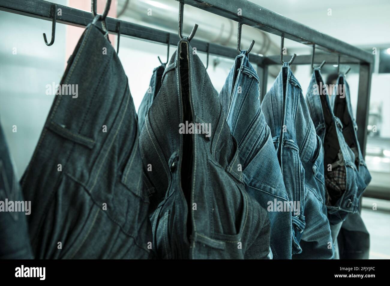 Process of denim jeans manufacturing hi-res stock photography and ...