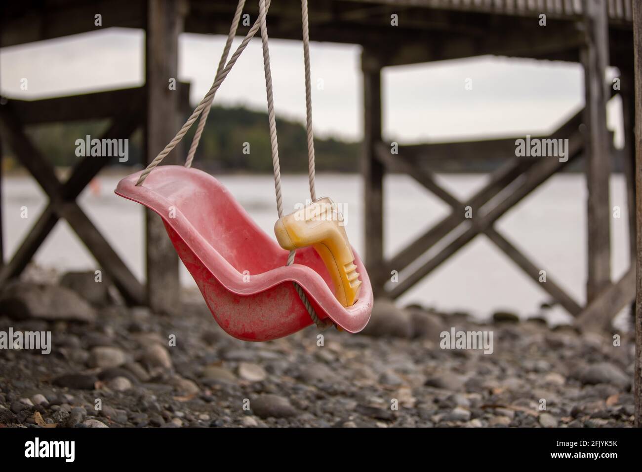 Empty Plastic Hanging Baby Chair by Lake Te Anau, South Island, New ...
