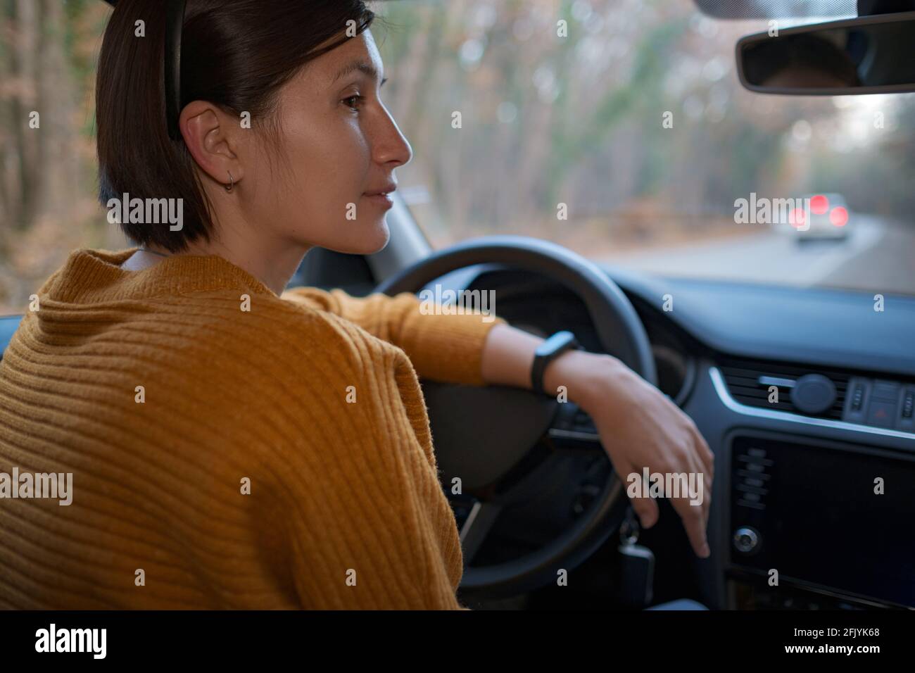 Woman car alone happy drive view hi-res stock photography and images ...