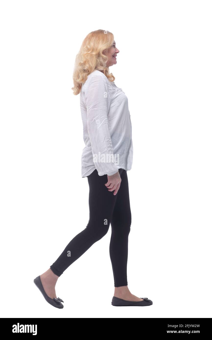 side view. woman in comfortable clothing striding forward Stock Photo ...