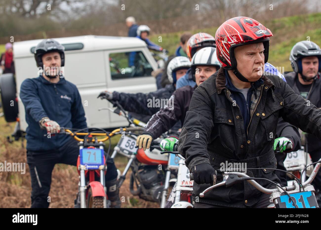 At a Suffolk motorcycle trial riders queue for the next section Stock ...