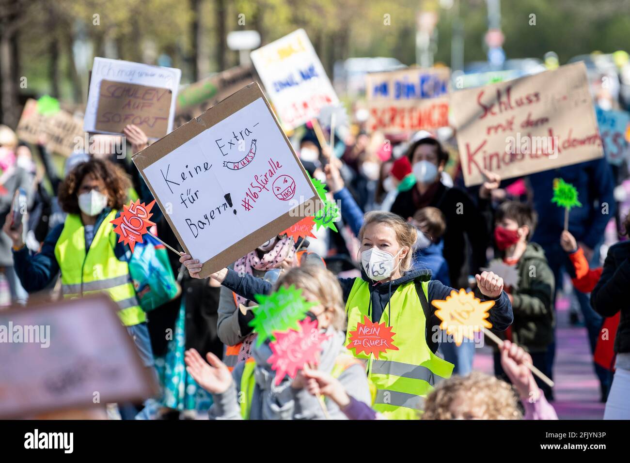 Munich, Germany. 27th Apr, 2021. A woman holds up a sign reading "No ...