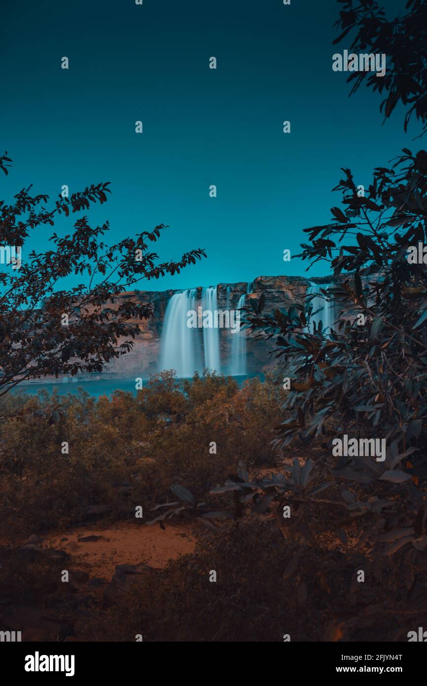 Eerie scenery of the Chitrakote Falls on the Indravati River behind ...