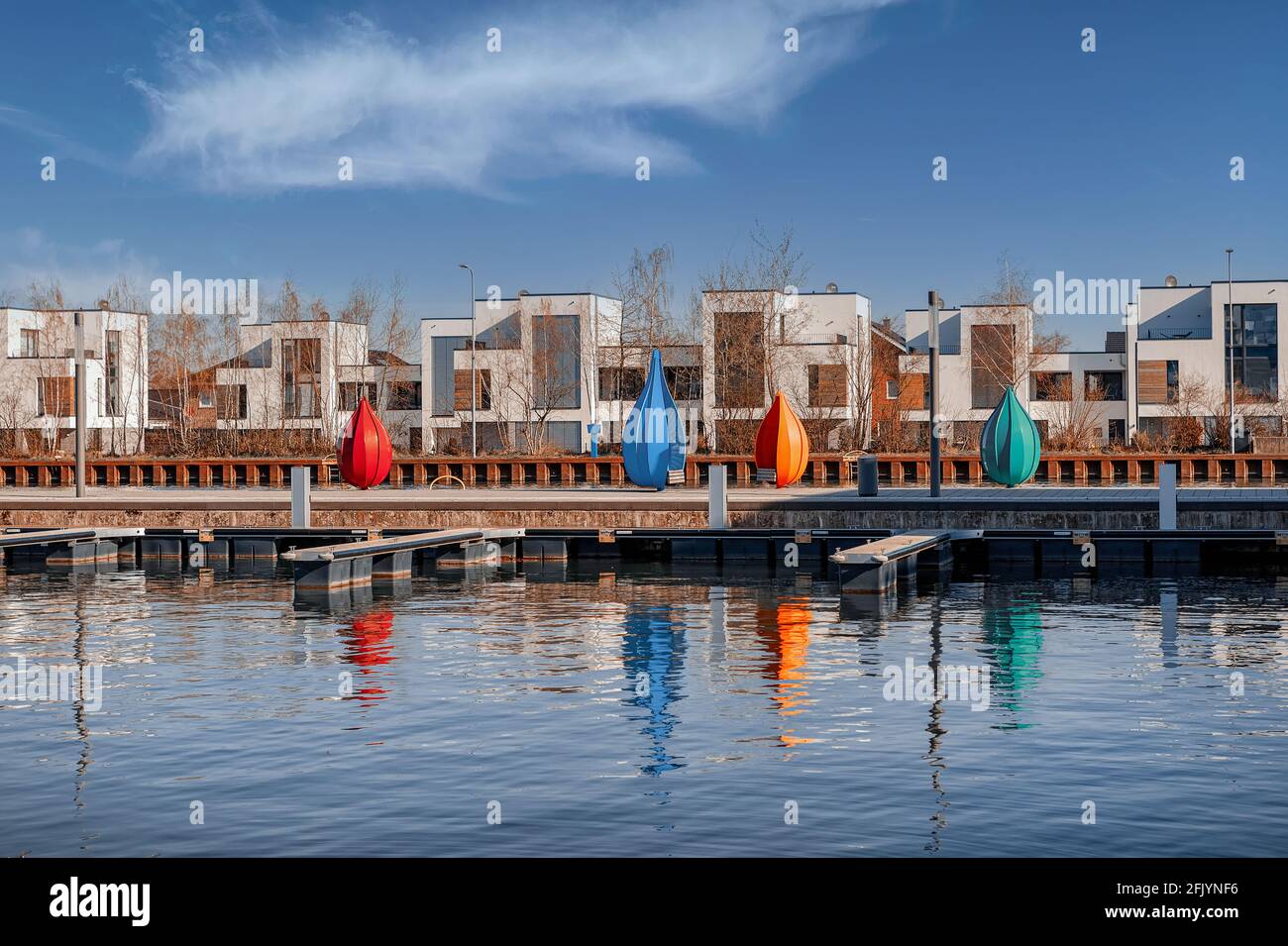 waterfront with blue sky, marina Stock Photo - Alamy