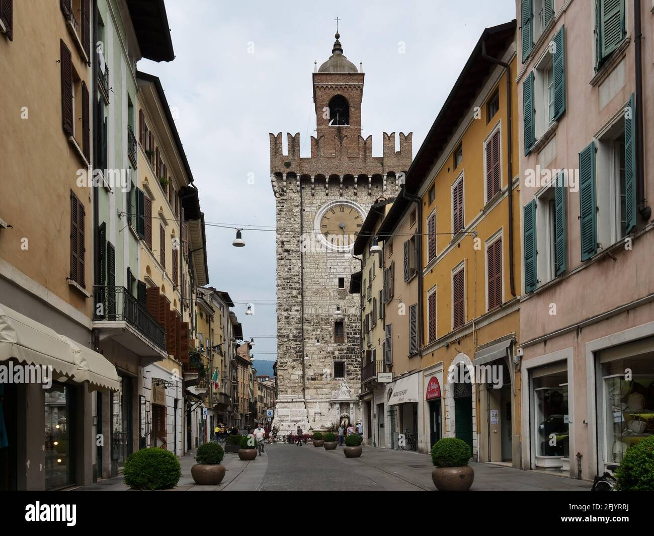 Torre della Pallata brick medieval clock tower building with merlons in ...