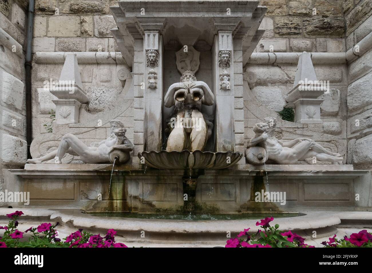 Torre della Pallata brick medieval clock tower building with merlons in ...