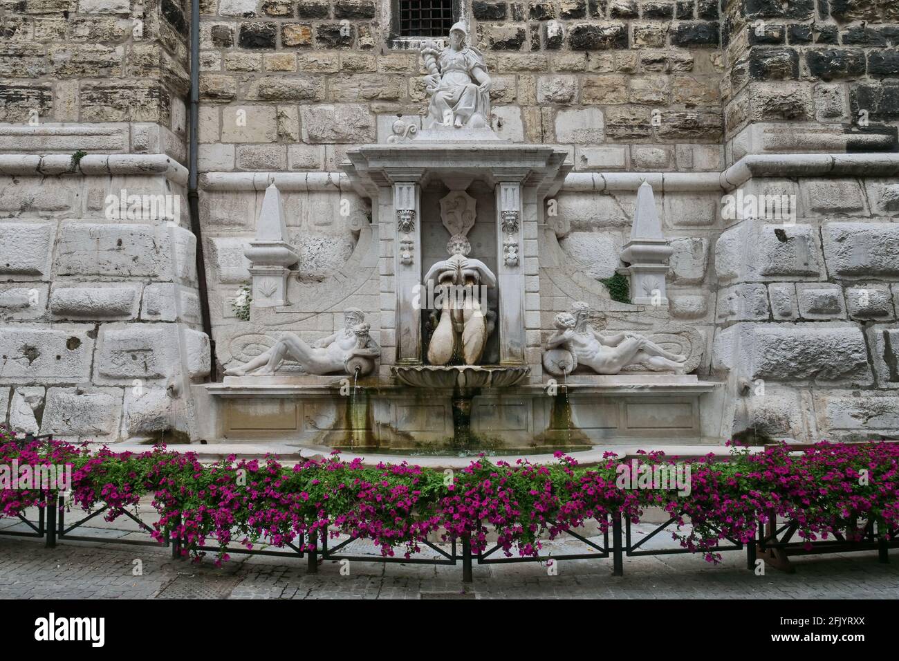 Torre della Pallata brick medieval clock tower building with merlons in ...