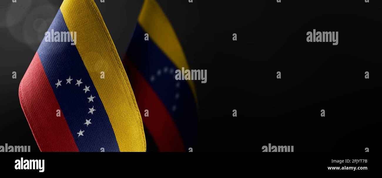 Small national flags of the Venezuela on a dark background Stock Photo ...