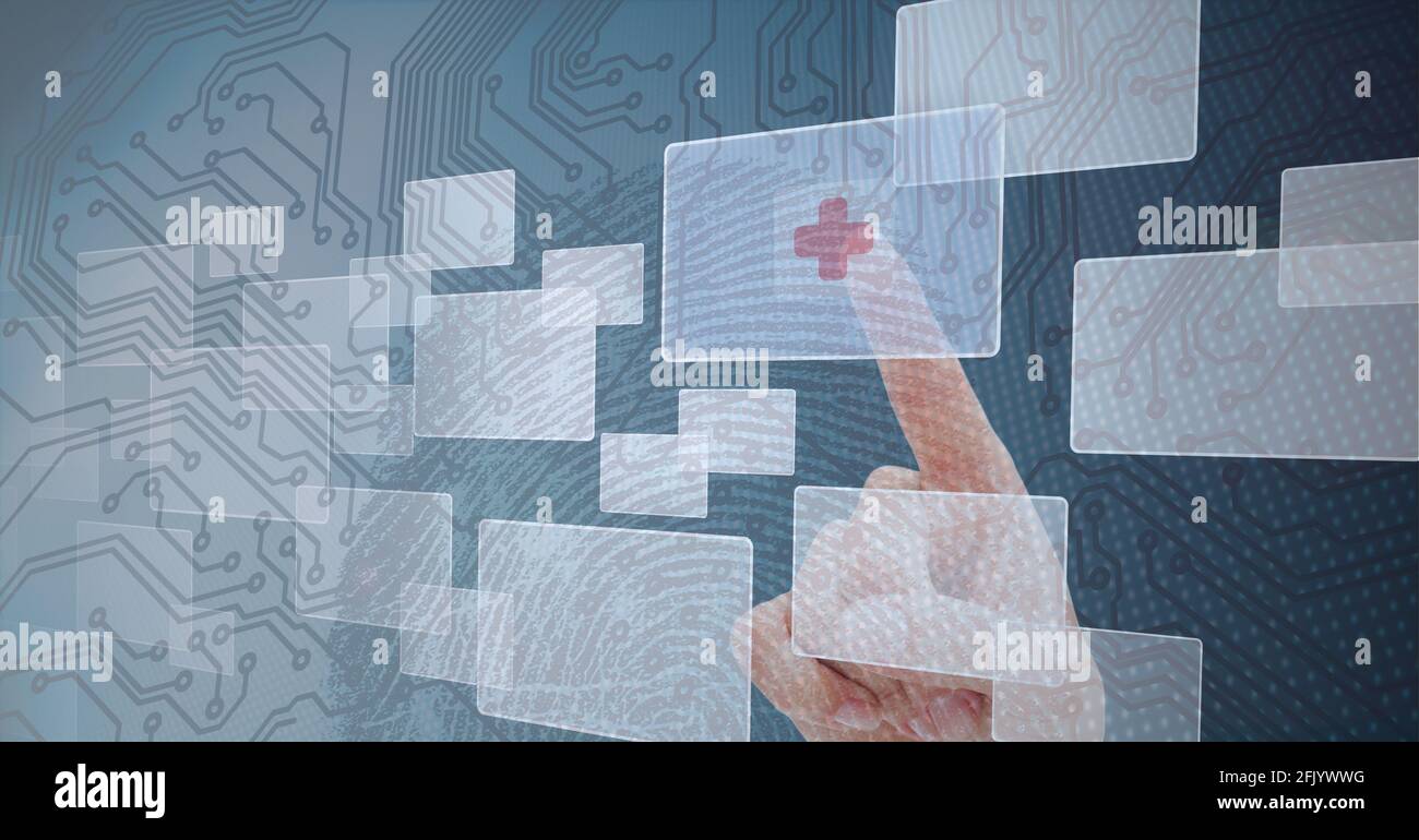 Composition of man touching virtual screen with red cross and circuit ...