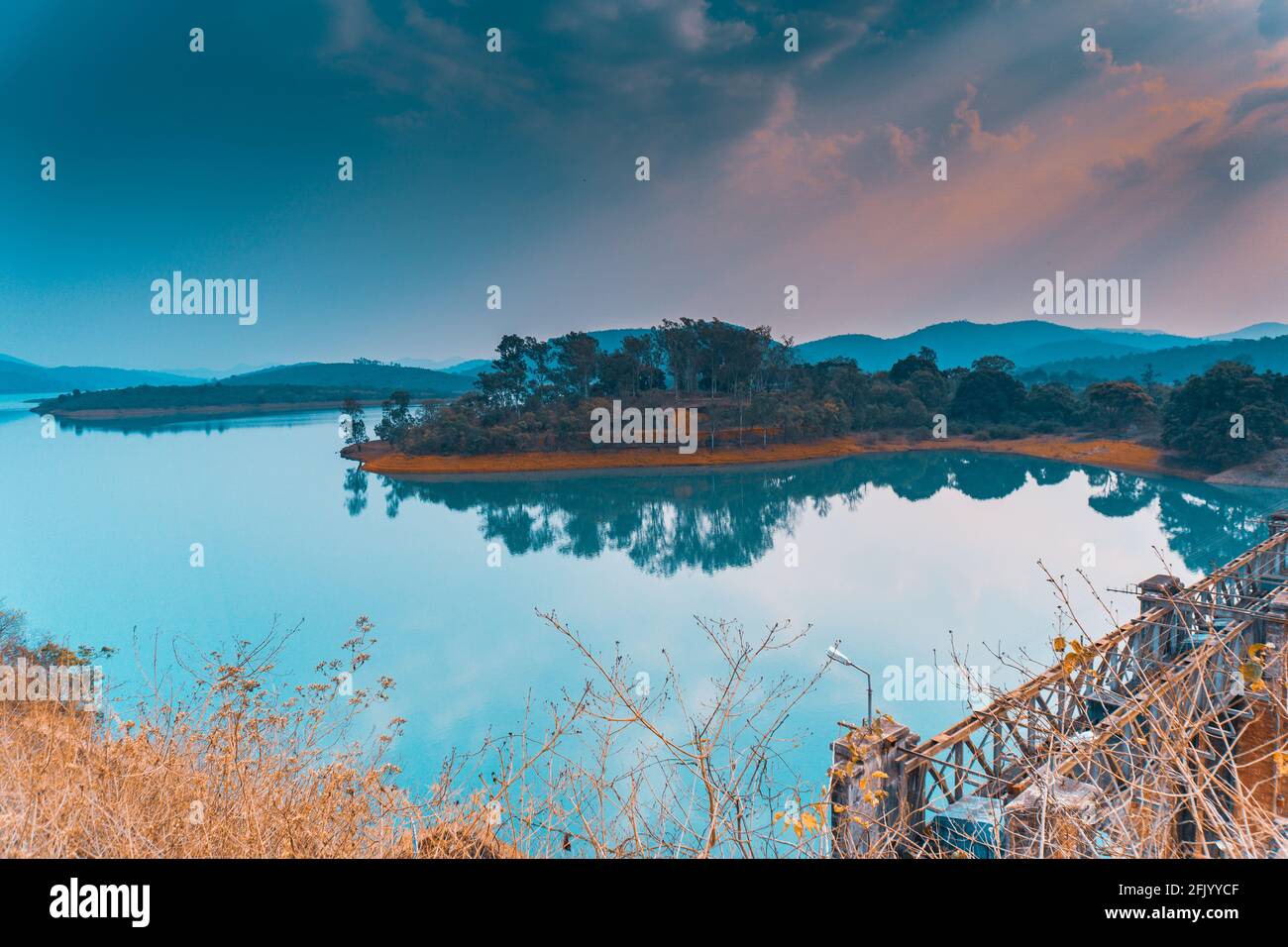 Picturesque landscape of the shoreline of the lake reflecting on the ...