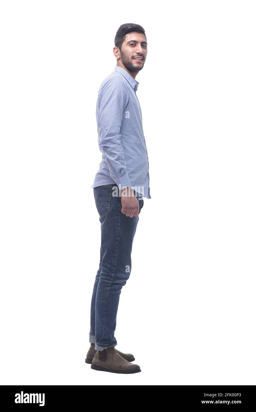 side view . confident young man looking at you Stock Photo - Alamy